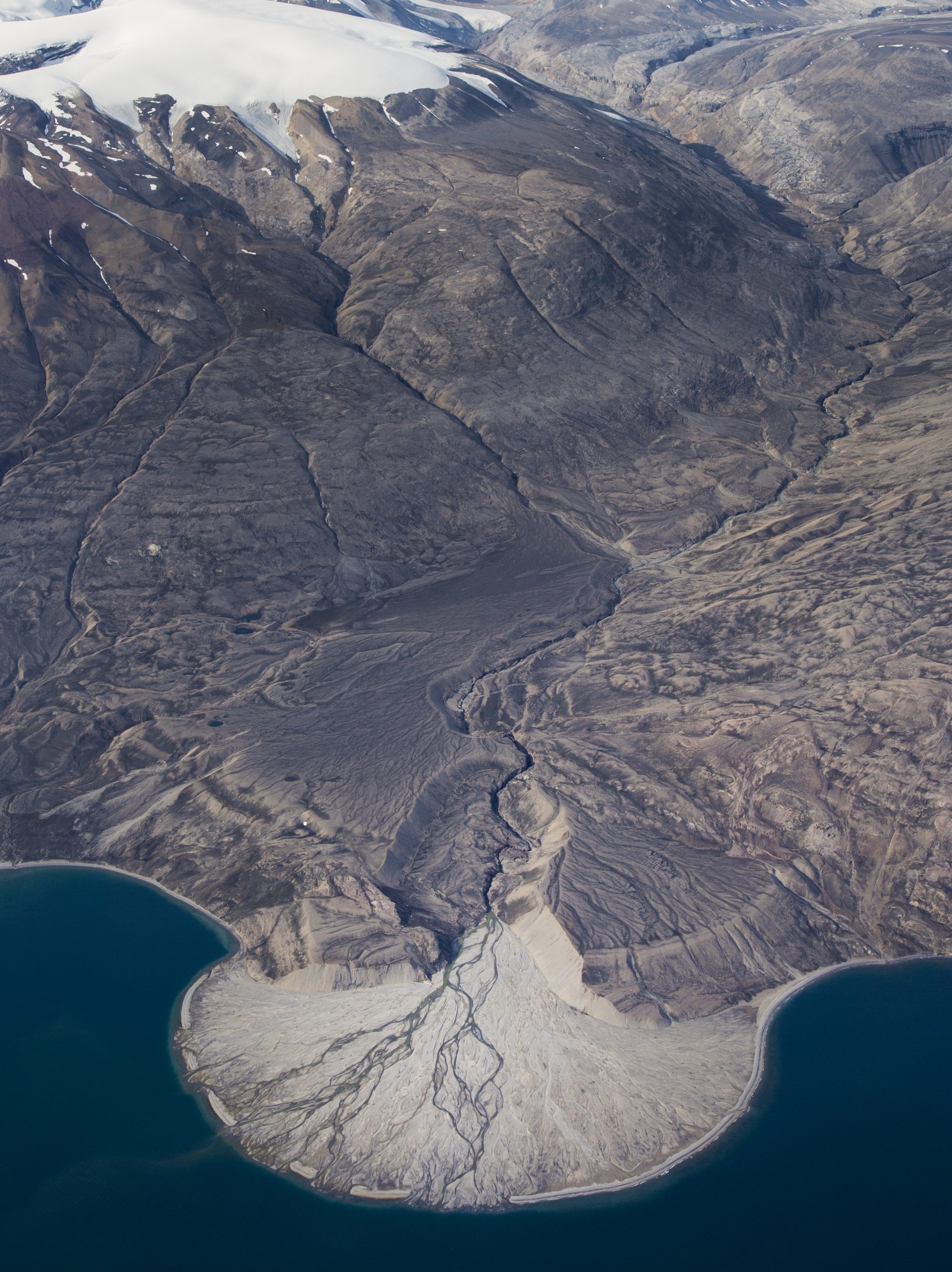 As Greenland’s Ice Melts, Glacial Sand Deposits May Offer a Welcome ...